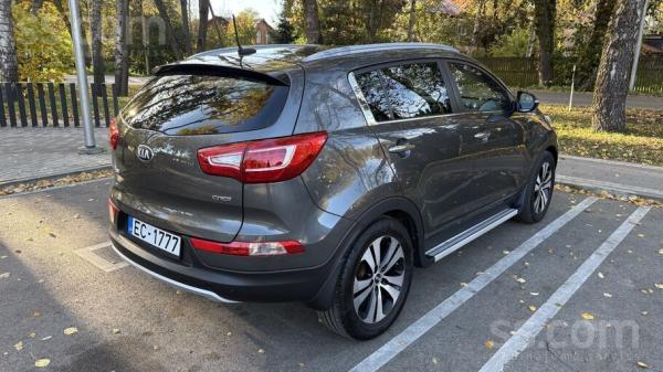 Kia Sportage 2013 Rīga vietnē Pelēks Kia Sportage 2013 Rīga, ar dzinēja tilpumu 2.00 L un nobraukumu 359 tūkst. km par 6400 €, foto 6 vietnē AUTOMOTO.COM.LV