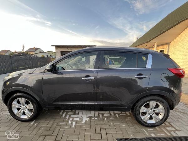 Grey Kia Sportage 2013 in Alytus, with an engine capacity of 1.70 L and mileage of 318 thousand km for 6600 €, photo 3 on AUTOMOTO.COM.LV