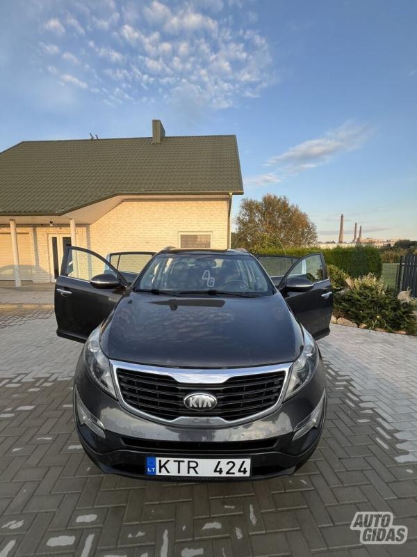 Grey Kia Sportage 2013 in Alytus, with an engine capacity of 1.70 L and mileage of 318 thousand km for 6600 €, photo 8 on AUTOMOTO.COM.LV