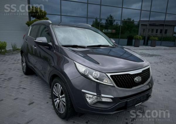 Grey Kia Sportage 2014 in Vilnius, with an engine capacity of 1.70 L and mileage of 208 thousand km for 7299 €, photo 1 on AUTOMOTO.COM.LV