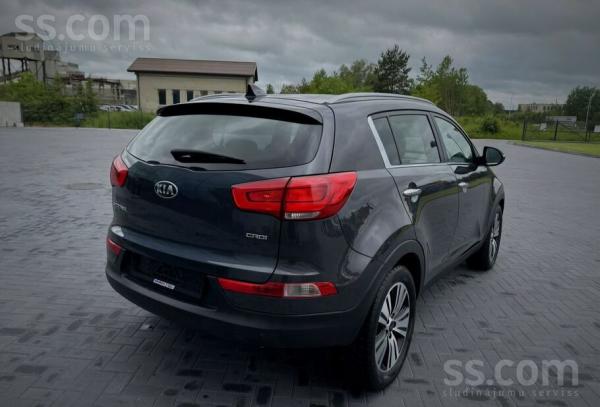 Grey Kia Sportage 2014 in Vilnius, with an engine capacity of 1.70 L and mileage of 208 thousand km for 7299 €, photo 7 on AUTOMOTO.COM.LV