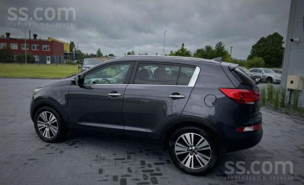 Grey Kia Sportage 2014 in Vilnius, with an engine capacity of 1.70 L and mileage of 208 thousand km for 7299 €, photo 10 on AUTOMOTO.COM.LV
