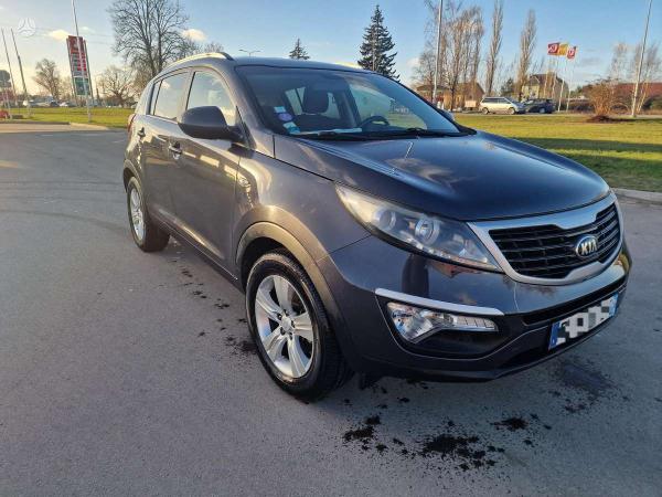 Grey Kia Sportage 2014 in Taurage, with an engine capacity of 1.60 L and mileage of 168 thousand km for 7200 €, photo 1 on AUTOMOTO.COM.LV