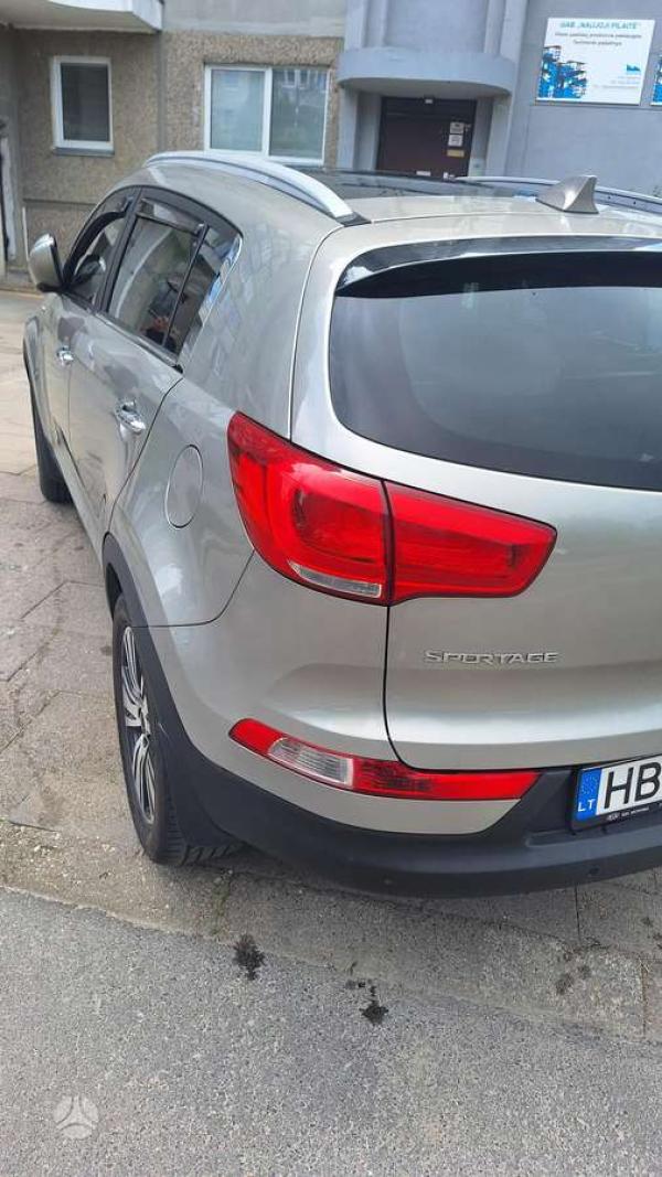 Grey Kia Sportage 2014 in Vilnius, with an engine capacity of 2.00 L and mileage of 194 thousand km for 10500 €, photo 4 on AUTOMOTO.COM.LV
