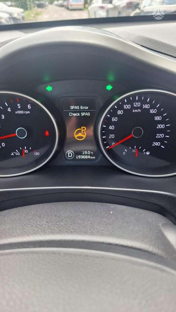 Grey Kia Sportage 2014 in Vilnius, with an engine capacity of 2.00 L and mileage of 194 thousand km for 10500 €, photo 9 on AUTOMOTO.COM.LV