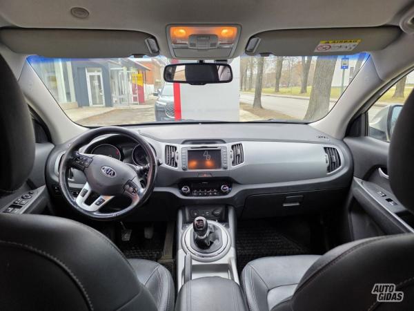 Grey Kia Sportage 2015 in Vilnius, with an engine capacity of 2.00 L and mileage of 116 thousand km for 8000 €, photo 7 on AUTOMOTO.COM.LV