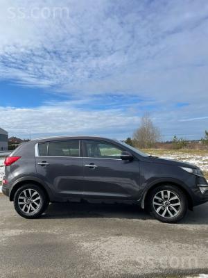 Grey Kia Sportage 2015 in Riga, with an engine capacity of 1.70 L and mileage of 0 thousand km for 8500 €, photo  on AUTOMOTO.COM.LV