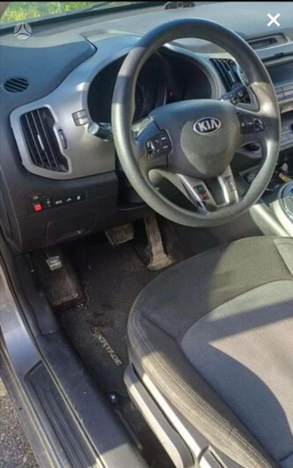 Grey Kia Sportage 2015 in Trakai, with an engine capacity of 2.36 L and mileage of 99 thousand km for 7500 €, photo 6 on AUTOMOTO.COM.LV