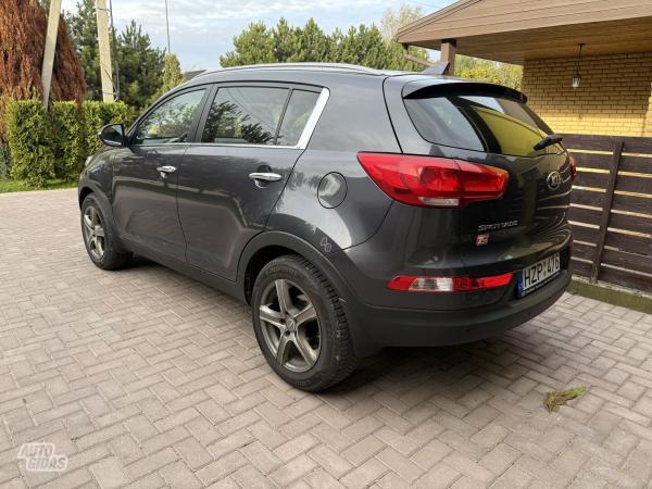 Grey Kia Sportage 2015 in Kaunas, with an engine capacity of 1.60 L and mileage of 158 thousand km for 7900 €, photo 3 on AUTOMOTO.COM.LV
