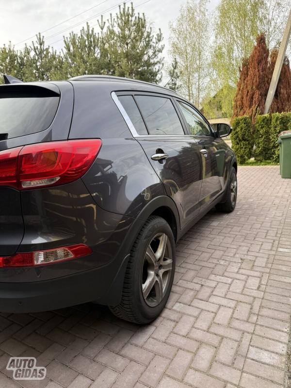 Grey Kia Sportage 2015 in Kaunas, with an engine capacity of 1.60 L and mileage of 158 thousand km for 7900 €, photo 5 on AUTOMOTO.COM.LV