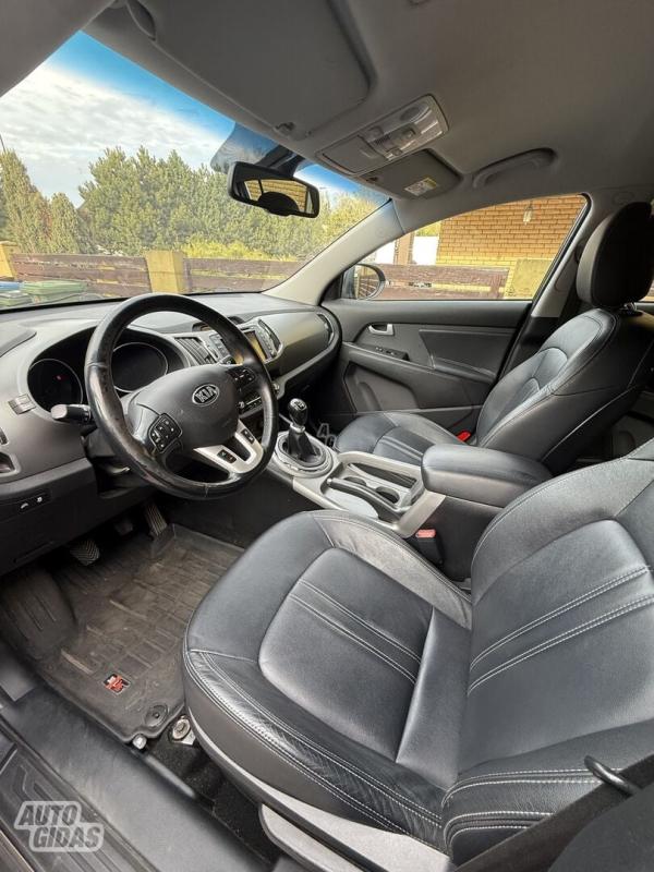 Grey Kia Sportage 2015 in Kaunas, with an engine capacity of 1.60 L and mileage of 158 thousand km for 7900 €, photo 8 on AUTOMOTO.COM.LV
