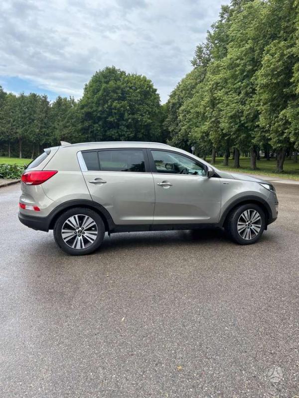 Pelēks Kia Sportage 2015 Marijampole, ar dzinēja tilpumu 2.00 L un nobraukumu 175 tūkst. km par 4000 €, foto 4 vietnē AUTOMOTO.COM.LV
