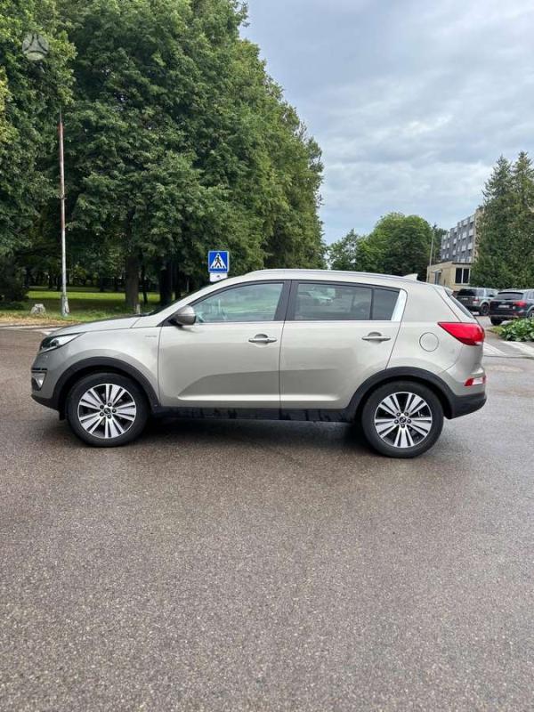 Pelēks Kia Sportage 2015 Marijampole, ar dzinēja tilpumu 2.00 L un nobraukumu 175 tūkst. km par 4000 €, foto 5 vietnē AUTOMOTO.COM.LV
