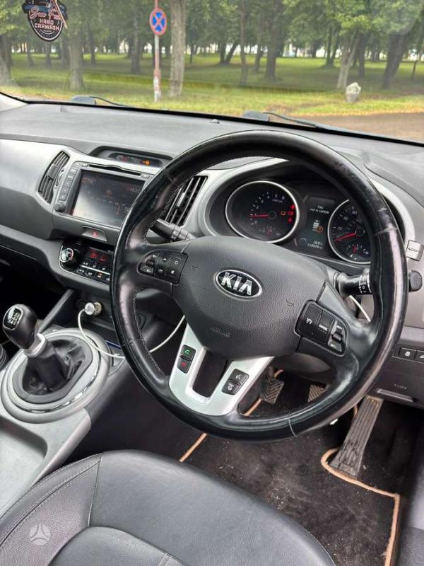 Pelēks Kia Sportage 2015 Marijampole, ar dzinēja tilpumu 2.00 L un nobraukumu 175 tūkst. km par 4000 €, foto 8 vietnē AUTOMOTO.COM.LV