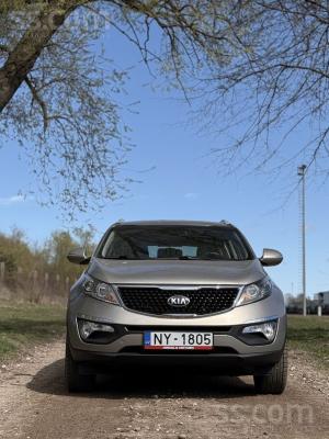 Grey Kia Sportage 2015 in Liepaja, with an engine capacity of 1.70 L and mileage of 149 thousand km for 9400 €, photo  on AUTOMOTO.COM.LV