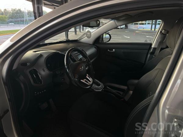 Grey Kia Sportage 2016 in Riga, with an engine capacity of 2.00 L and mileage of 94 thousand km for 11200 €, photo 7 on AUTOMOTO.COM.LV