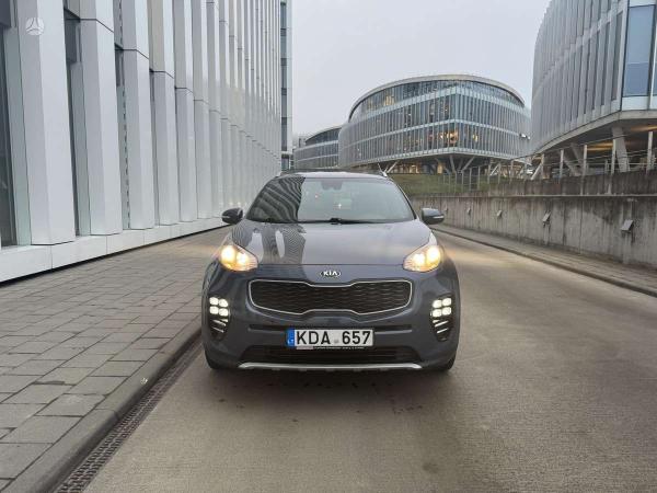 Grey Kia Sportage 2018 in Vilnius, with an engine capacity of 1.59 L and mileage of 119 thousand km for 13499 €, photo 3 on AUTOMOTO.COM.LV