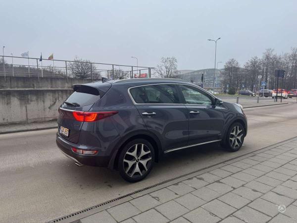 Grey Kia Sportage 2018 in Vilnius, with an engine capacity of 1.59 L and mileage of 119 thousand km for 13499 €, photo 4 on AUTOMOTO.COM.LV