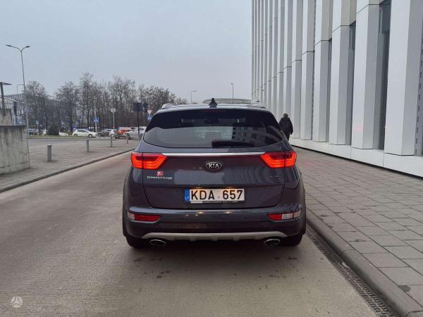Grey Kia Sportage 2018 in Vilnius, with an engine capacity of 1.59 L and mileage of 119 thousand km for 13499 €, photo 5 on AUTOMOTO.COM.LV