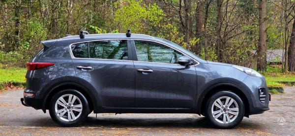 Grey Kia Sportage 2018 in Vilnius, with an engine capacity of 1.59 L and mileage of 189 thousand km for 11900 €, photo 9 on AUTOMOTO.COM.LV