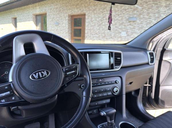 Grey Kia Sportage 2019 in Vilnius, with an engine capacity of 1.60 L and mileage of 115 thousand km for 14300 €, photo 3 on AUTOMOTO.COM.LV