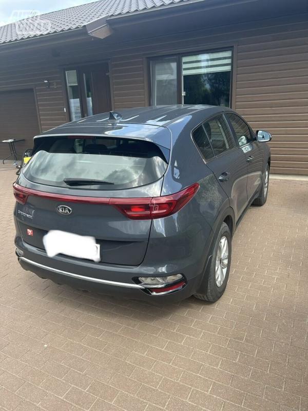 Grey Kia Sportage 2021 in Vilnius, with an engine capacity of 1.60 L and mileage of 59 thousand km for 15500 €, photo 3 on AUTOMOTO.COM.LV