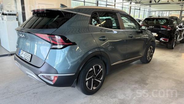 Grey Kia Sportage 2022 in Riga, with an engine capacity of 1.60 L and mileage of 99 thousand km for 18900 €, photo 3 on AUTOMOTO.COM.LV