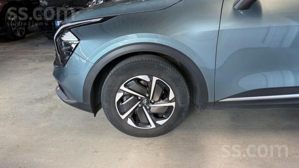 Grey Kia Sportage 2022 in Riga, with an engine capacity of 1.60 L and mileage of 99 thousand km for 18900 €, photo 6 on AUTOMOTO.COM.LV