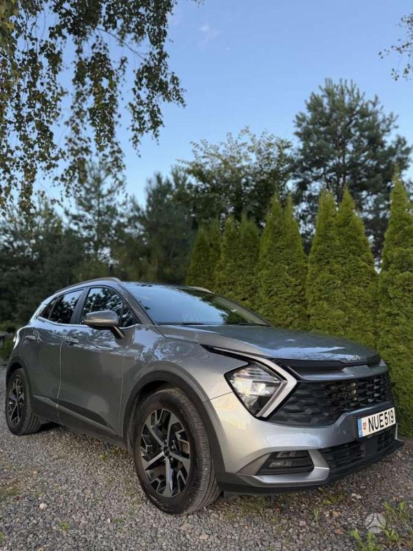 Grey Kia Sportage 2022 in Vilnius, with an engine capacity of 1.60 L and mileage of 70 thousand km for 24300 €, photo 1 on AUTOMOTO.COM.LV