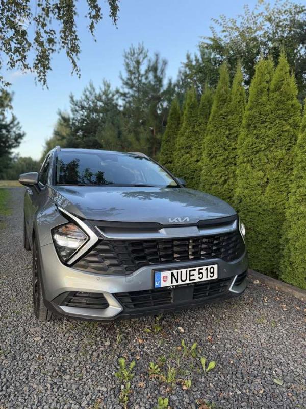 Grey Kia Sportage 2022 in Vilnius, with an engine capacity of 1.60 L and mileage of 70 thousand km for 24300 €, photo 3 on AUTOMOTO.COM.LV