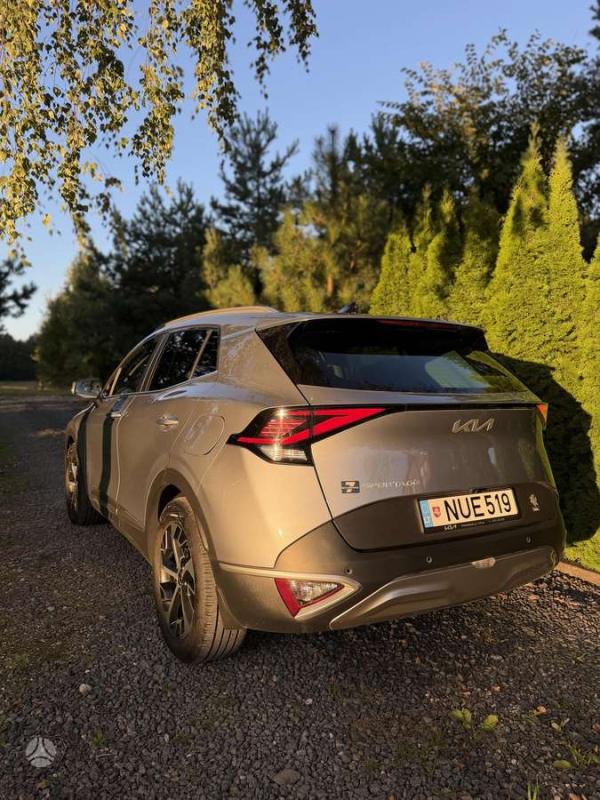 Grey Kia Sportage 2022 in Vilnius, with an engine capacity of 1.60 L and mileage of 70 thousand km for 24300 €, photo 4 on AUTOMOTO.COM.LV