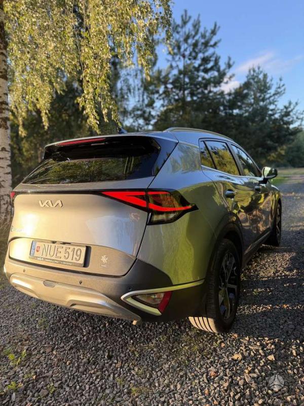Grey Kia Sportage 2022 in Vilnius, with an engine capacity of 1.60 L and mileage of 70 thousand km for 24300 €, photo 5 on AUTOMOTO.COM.LV