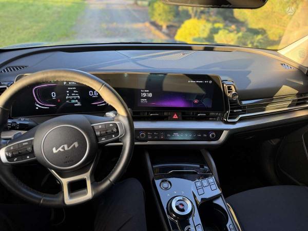 Grey Kia Sportage 2022 in Vilnius, with an engine capacity of 1.60 L and mileage of 70 thousand km for 24300 €, photo 6 on AUTOMOTO.COM.LV