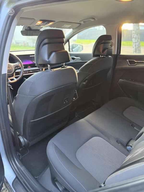 Grey Kia Sportage 2022 in Vilnius, with an engine capacity of 1.60 L and mileage of 70 thousand km for 24300 €, photo 9 on AUTOMOTO.COM.LV