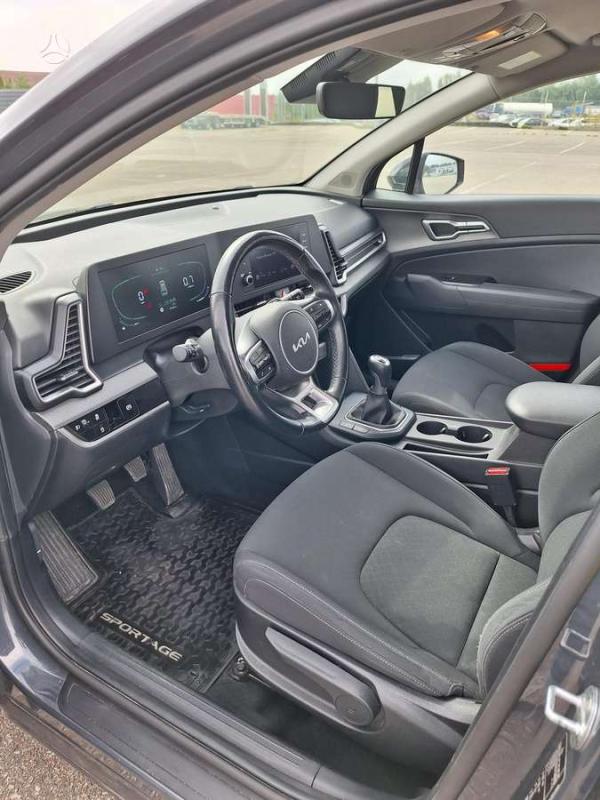 Grey Kia Sportage 2022 in Vilnius, with an engine capacity of 1.60 L and mileage of 85 thousand km for 18500 €, photo 11 on AUTOMOTO.COM.LV