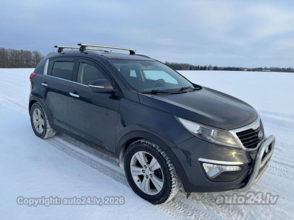 Grey Kia Sportage 2011 in Tallinn, with an engine capacity of 1.70 L and mileage of 297 thousand km for 7000 €, photo 4 on AUTOMOTO.COM.LV