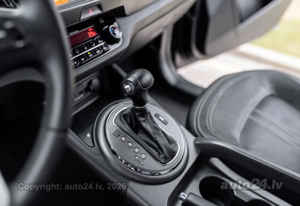 Grey Kia Sportage 2012 in Tallinn, with an engine capacity of 2.00 L and mileage of 216 thousand km for 6990 €, photo 10 on AUTOMOTO.COM.LV
