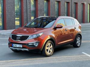 Orange Kia Sportage 2011 in Klaipeda, with an engine capacity of 2.00 L and mileage of 310 thousand km for 5900 €, photo  on AUTOMOTO.COM.LV