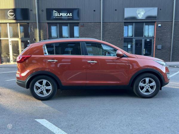 Oranžs Kia Sportage 2011 Klaipėda, ar dzinēja tilpumu 2.00 L un nobraukumu 310 tūkst. km par 5900 €, foto 4 vietnē AUTOMOTO.COM.LV