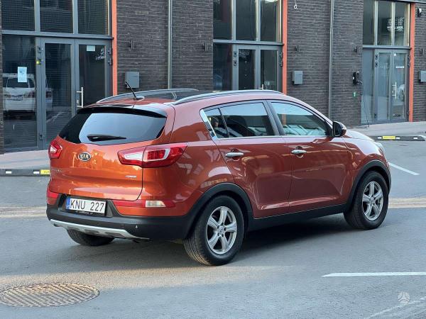 Oranžs Kia Sportage 2011 Klaipėda, ar dzinēja tilpumu 2.00 L un nobraukumu 310 tūkst. km par 5900 €, foto 5 vietnē AUTOMOTO.COM.LV