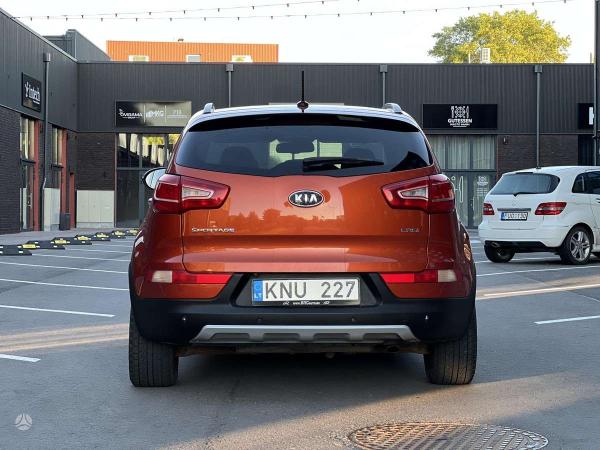 Oranžs Kia Sportage 2011 Klaipėda, ar dzinēja tilpumu 2.00 L un nobraukumu 310 tūkst. km par 5900 €, foto 6 vietnē AUTOMOTO.COM.LV