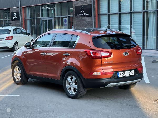 Oranžs Kia Sportage 2011 Klaipėda, ar dzinēja tilpumu 2.00 L un nobraukumu 310 tūkst. km par 5900 €, foto 7 vietnē AUTOMOTO.COM.LV