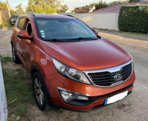 Orange Kia Sportage 2011 in Taurage, with an engine capacity of 1.69 L and mileage of 218 thousand km for 3800 €, photo 1 on AUTOMOTO.COM.LV