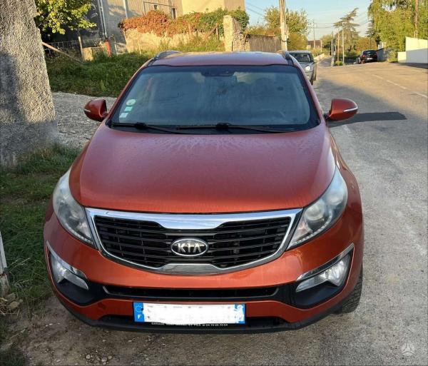 Orange Kia Sportage 2011 in Taurage, with an engine capacity of 1.69 L and mileage of 218 thousand km for 3800 €, photo 3 on AUTOMOTO.COM.LV