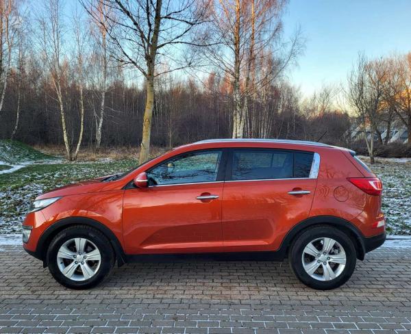 Oranžs Kia Sportage 2012 Šauļi, ar dzinēja tilpumu 1.60 L un nobraukumu 211 tūkst. km par 5950 €, foto 5 vietnē AUTOMOTO.COM.LV