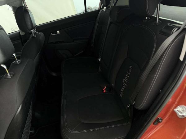 Orange Kia Sportage 2012 in Vilnius, with an engine capacity of 1.59 L and mileage of 205 thousand km for 6650 €, photo 10 on AUTOMOTO.COM.LV