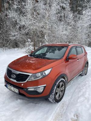 Oranžs Kia Sportage 2012 Viļņa, ar dzinēja tilpumu 1.69 L un nobraukumu 217 tūkst. km par 6700 €, foto  vietnē AUTOMOTO.COM.LV