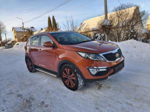 Orange Kia Sportage 2012 in Siauliai, with an engine capacity of 2.00 L and mileage of 217 thousand km for 5200 €, photo  on AUTOMOTO.COM.LV