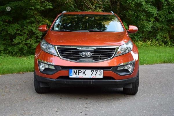 Orange Kia Sportage 2012 in Alytus, with an engine capacity of 2.00 L and mileage of 193 thousand km for 6500 €, photo 1 on AUTOMOTO.COM.LV