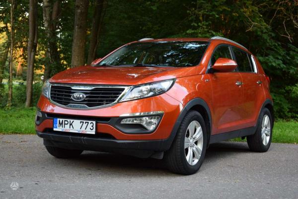 Orange Kia Sportage 2012 in Alytus, with an engine capacity of 2.00 L and mileage of 193 thousand km for 6500 €, photo 2 on AUTOMOTO.COM.LV